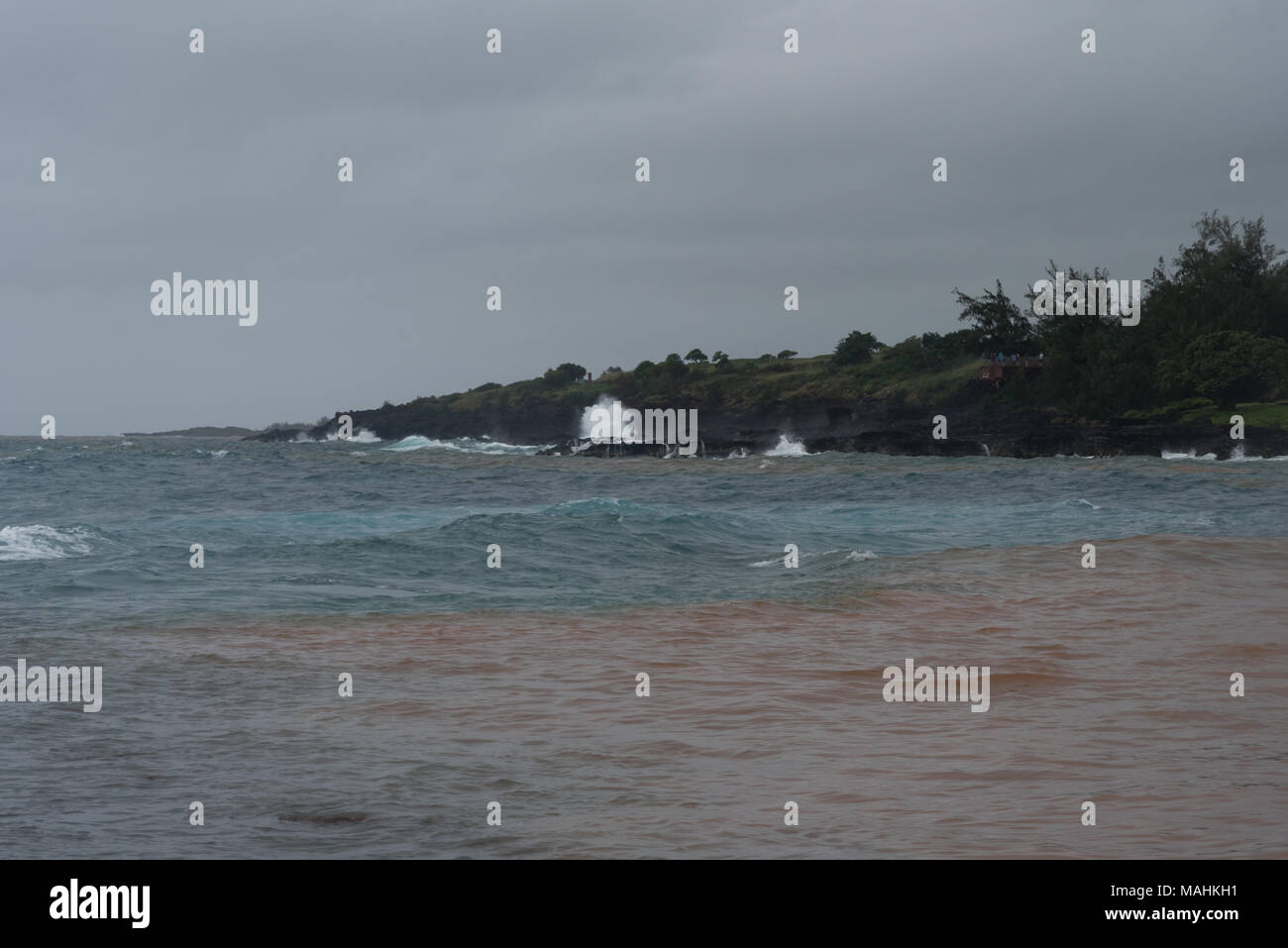 Red water in the Kukuiula bay on Kauai after a major rainstorm Stock ...