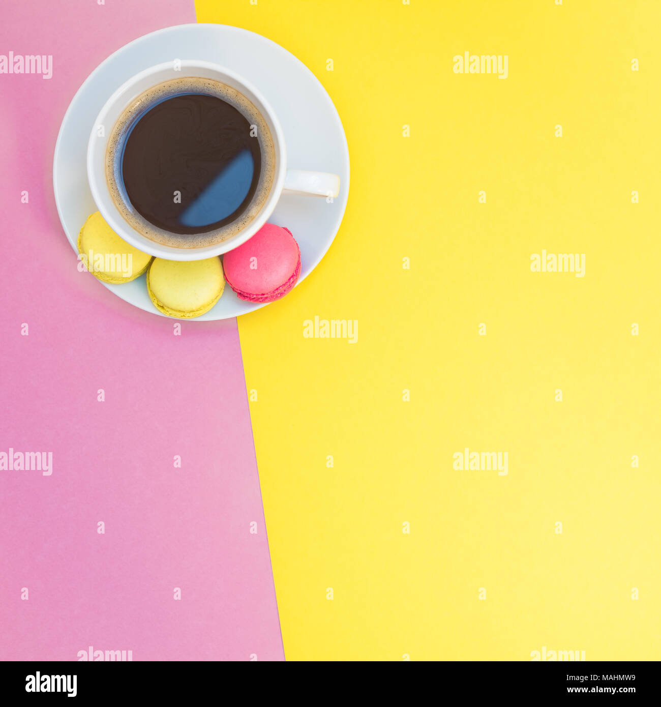 Creative flat lay photo of coffee cup and macaroons with copy space on ...
