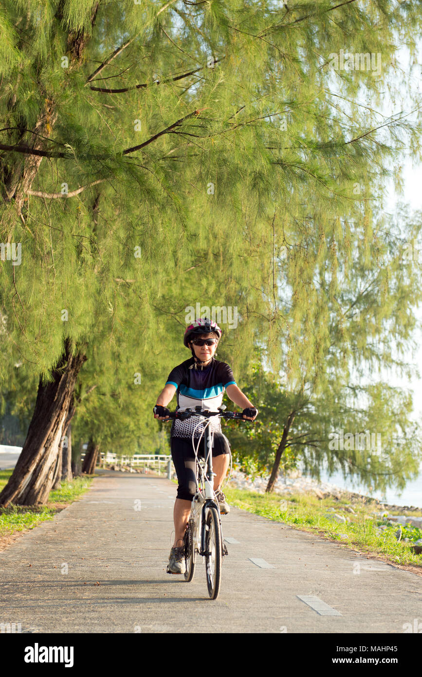 Chinese woman cyclist hi-res stock photography and images - Alamy