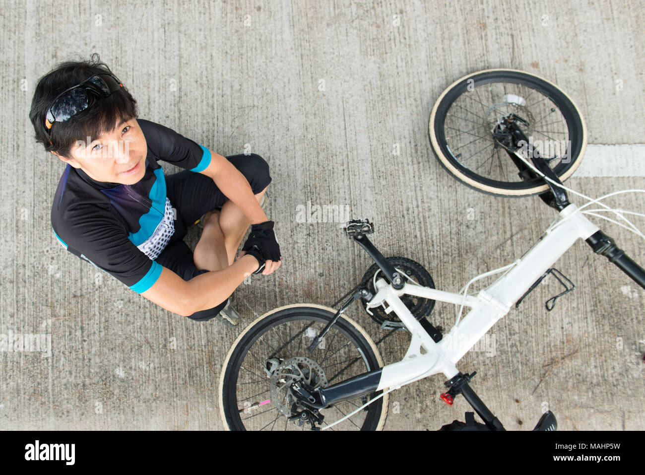 Chinese woman riding a bicycle hi-res stock photography and images - Alamy