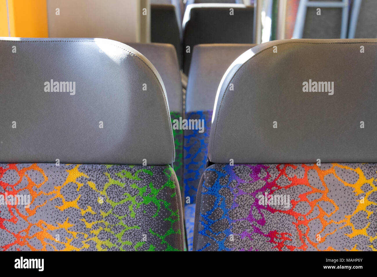 Public bus train chair seat colorful switzerland Stock Photo - Alamy