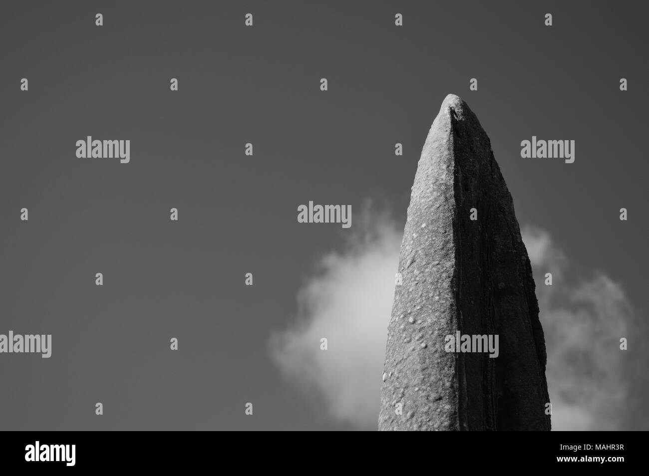 A Rock alone in the sky Stock Photo - Alamy