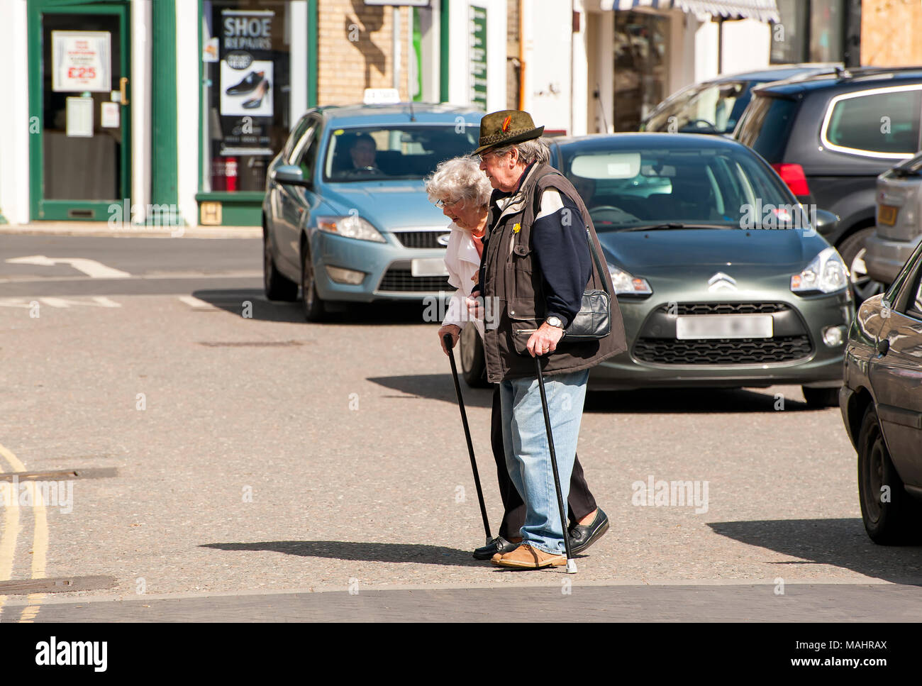 Elderly crossing road uk hi-res stock photography and images - Alamy