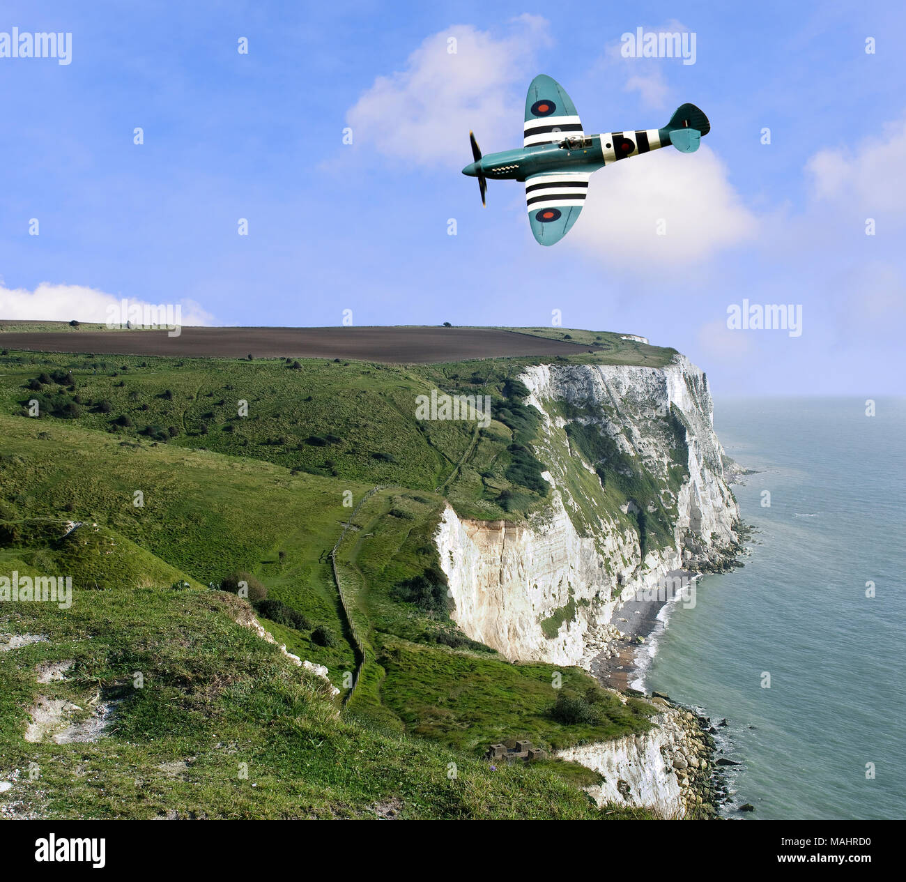 spitfire over the white cliffs of dover Stock Photo - Alamy
