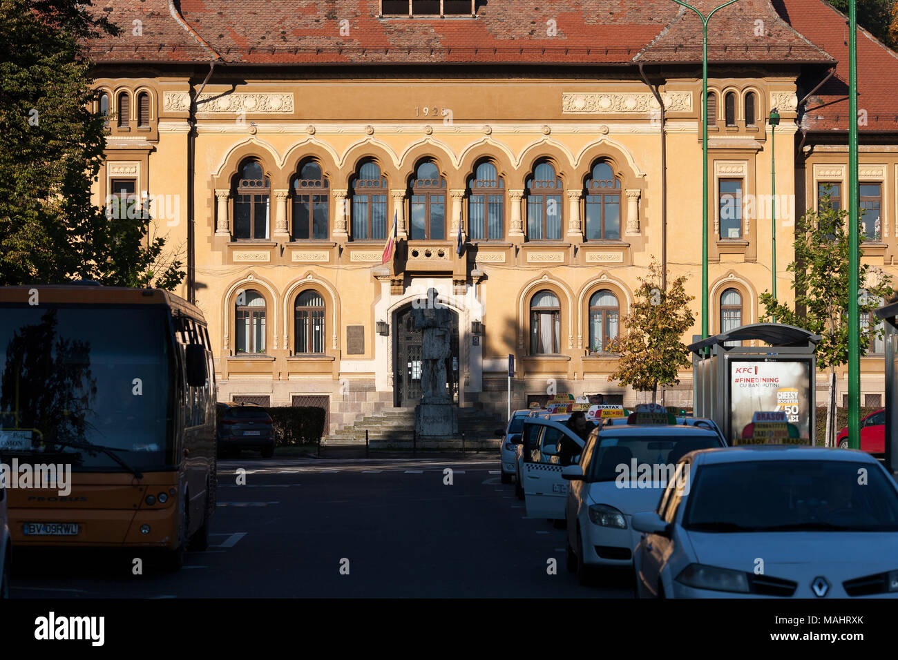 A crowd of people wait for the buses at the central parade in Brasov ...