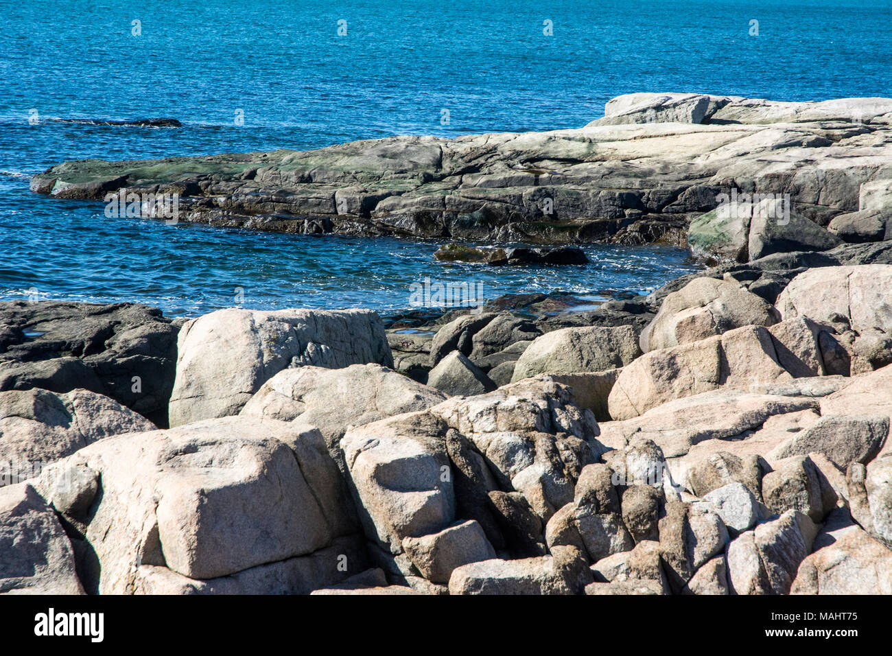 This coastline of rocks and boulder represents or looks like a ...