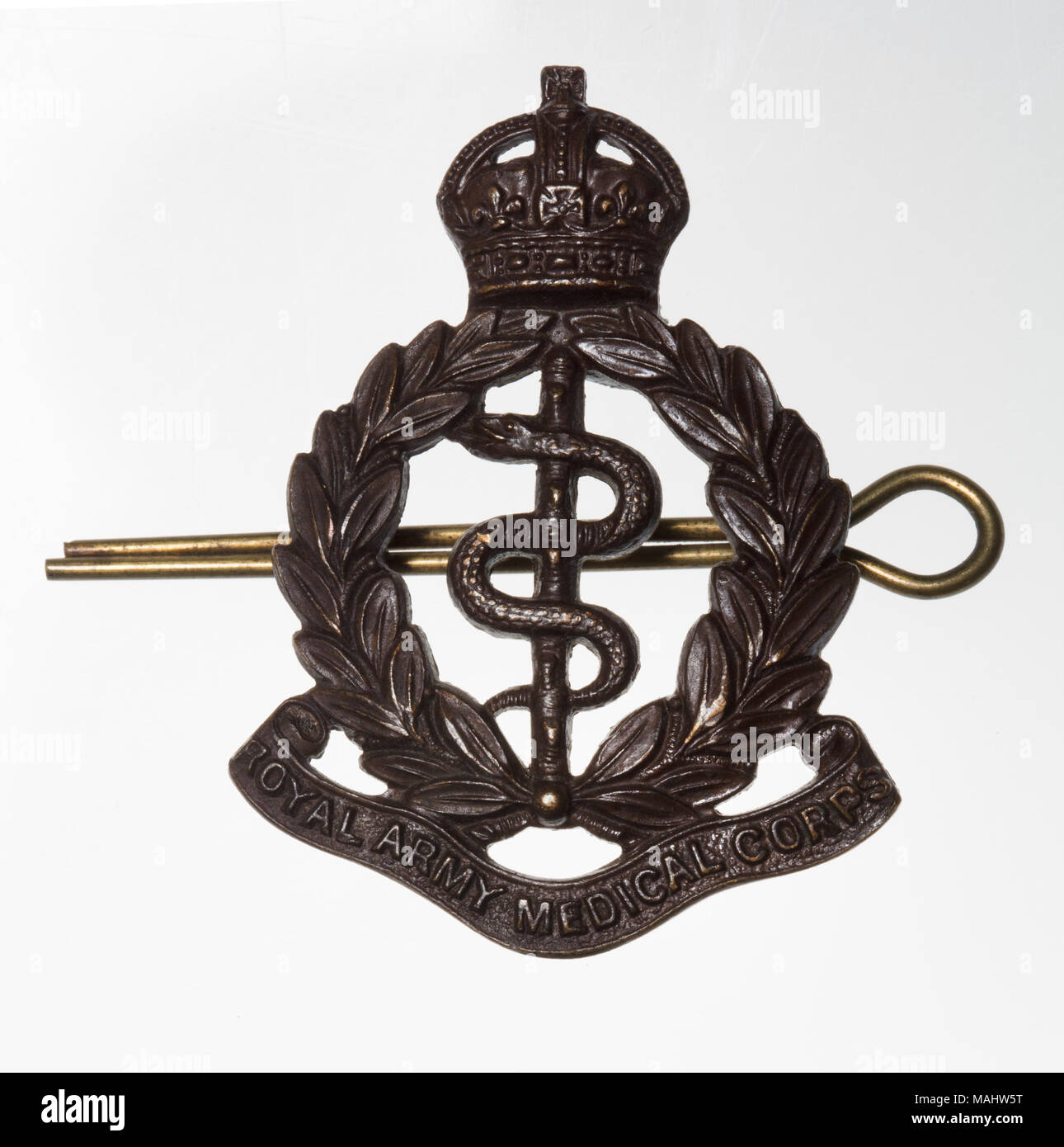 Dark metal caduceus pin with open work from Royal Army Medical Corps ...