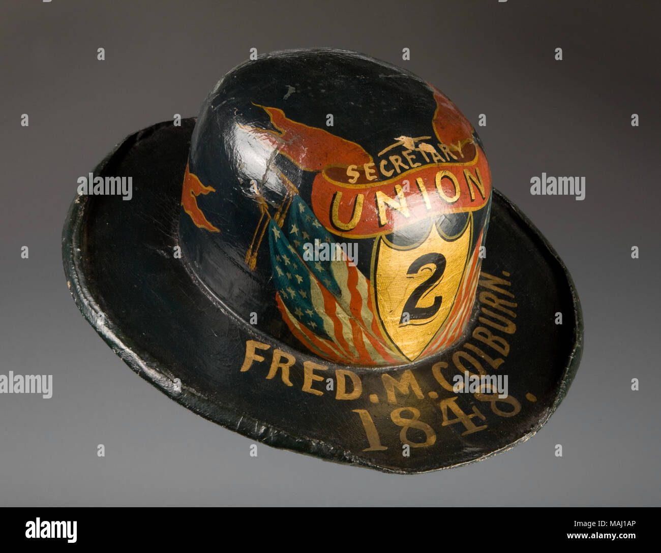 Painted fire hat worn by Fred Colburn of Union Co. No. 2 constructed of ...