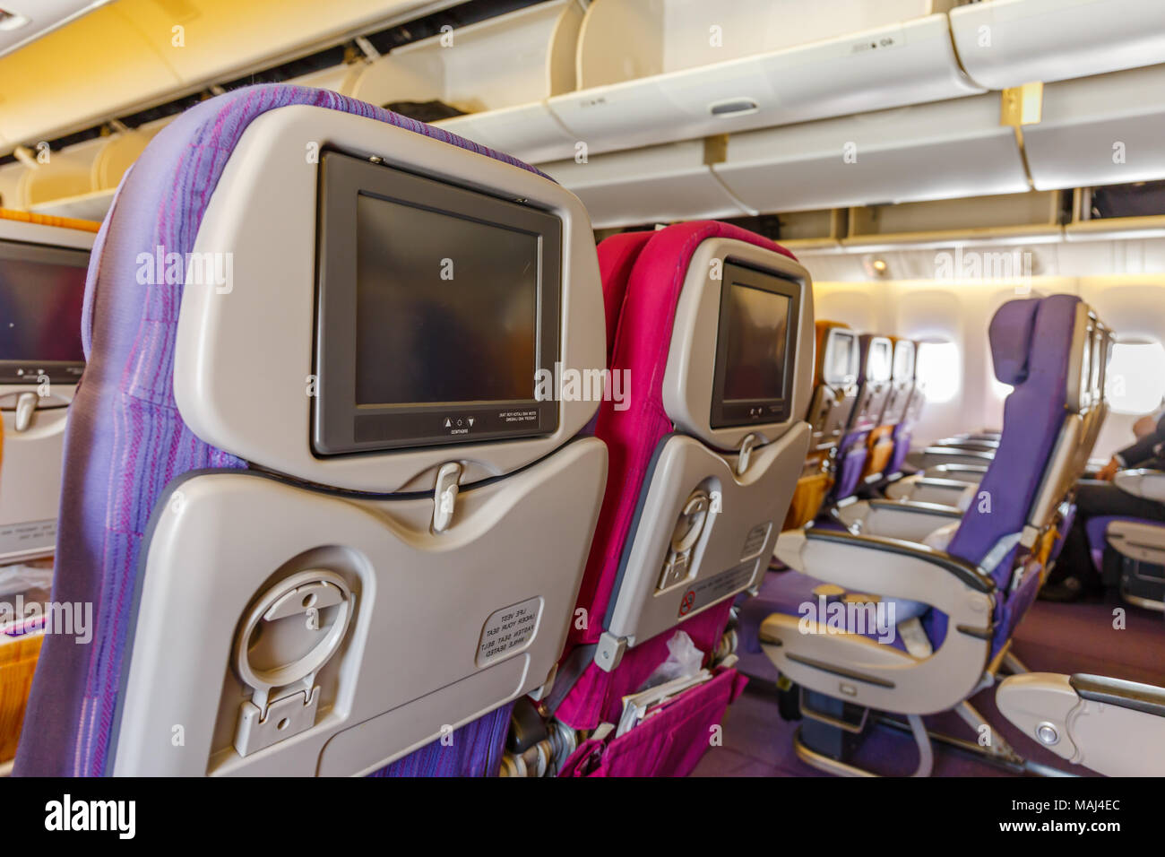 Interior of large passengers airplane Stock Photo - Alamy