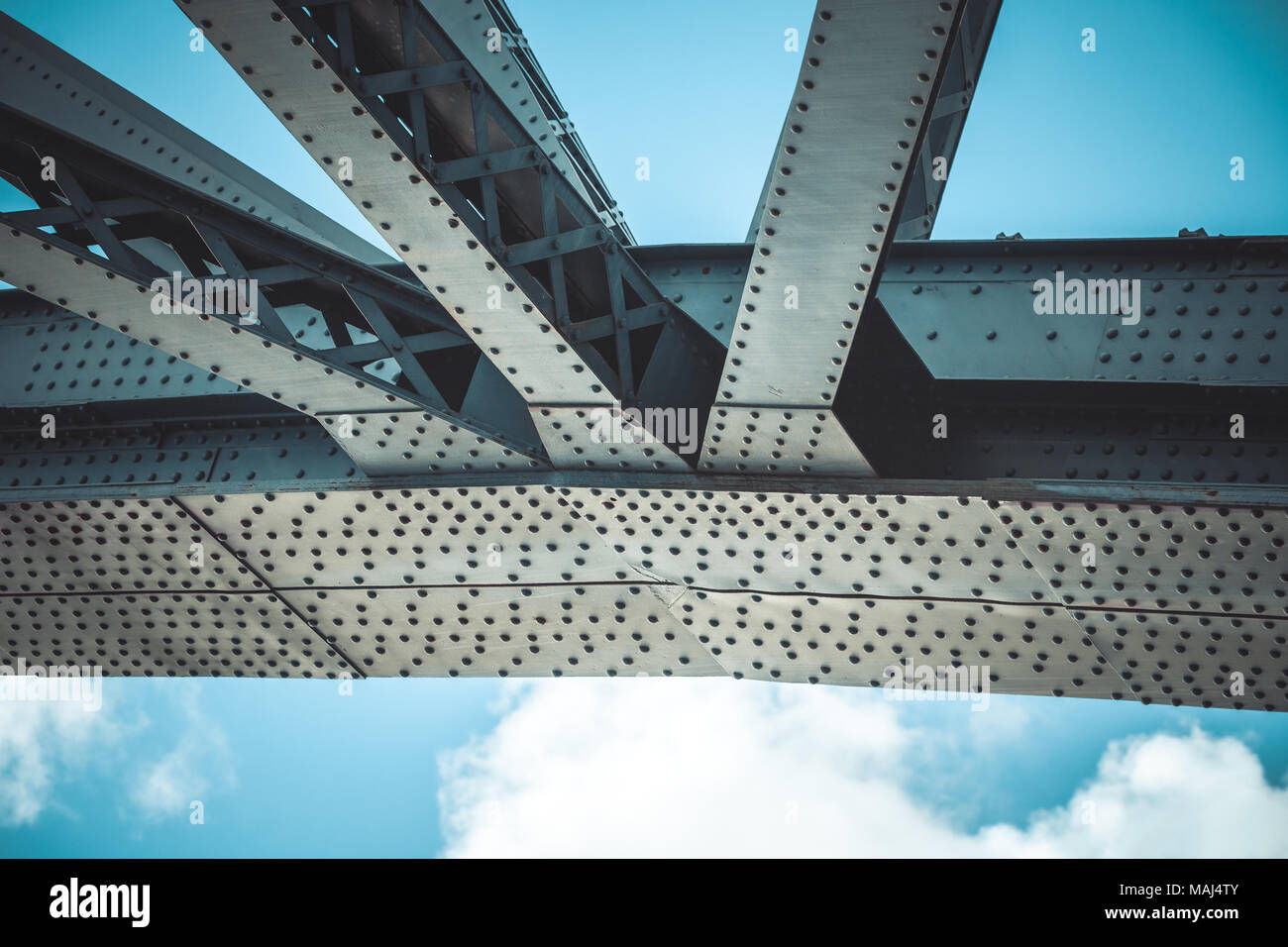 Bridge frame closeup on blue sky background. Horizontal toned image ...