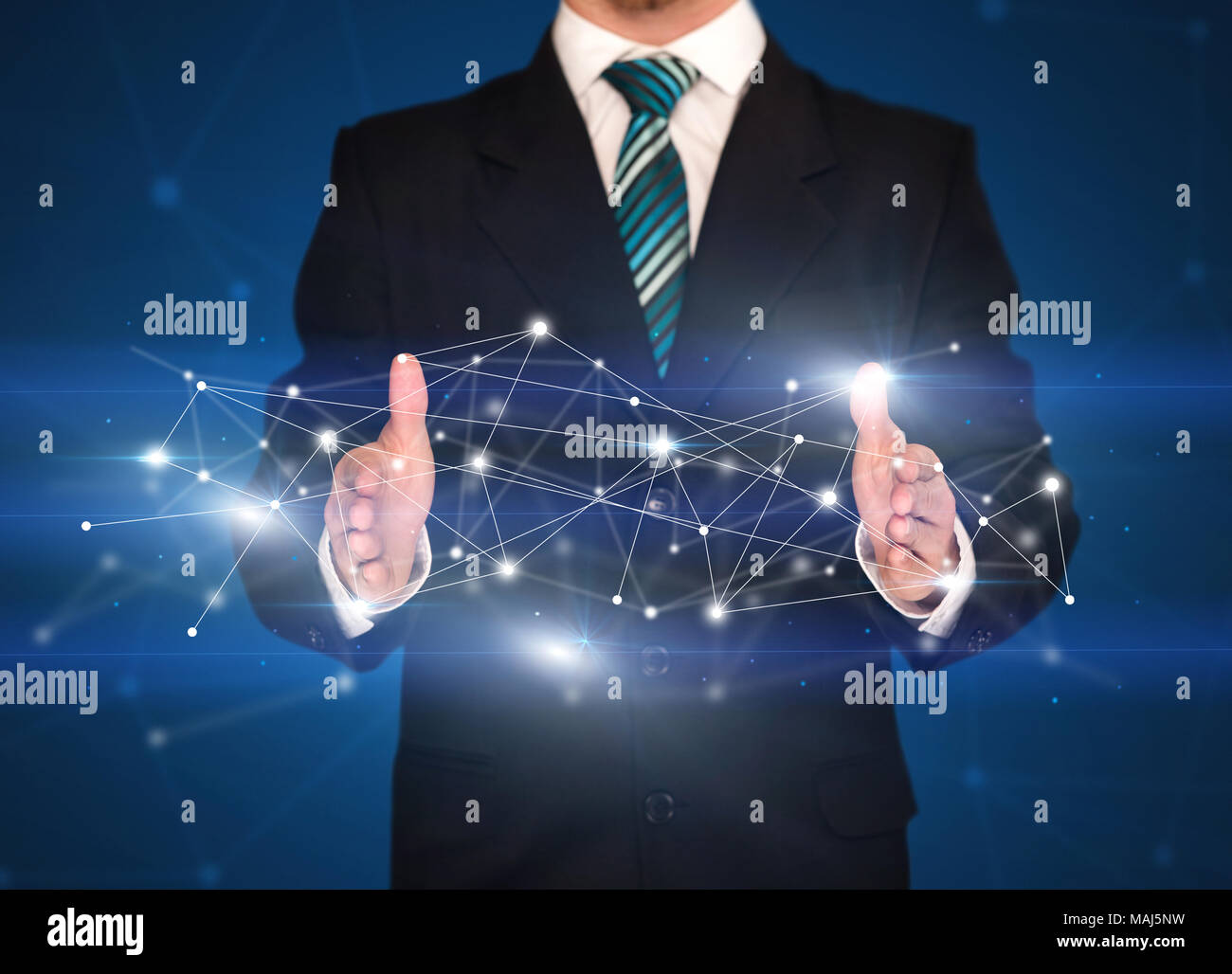 Businessman with network connection concept between his hands Stock ...