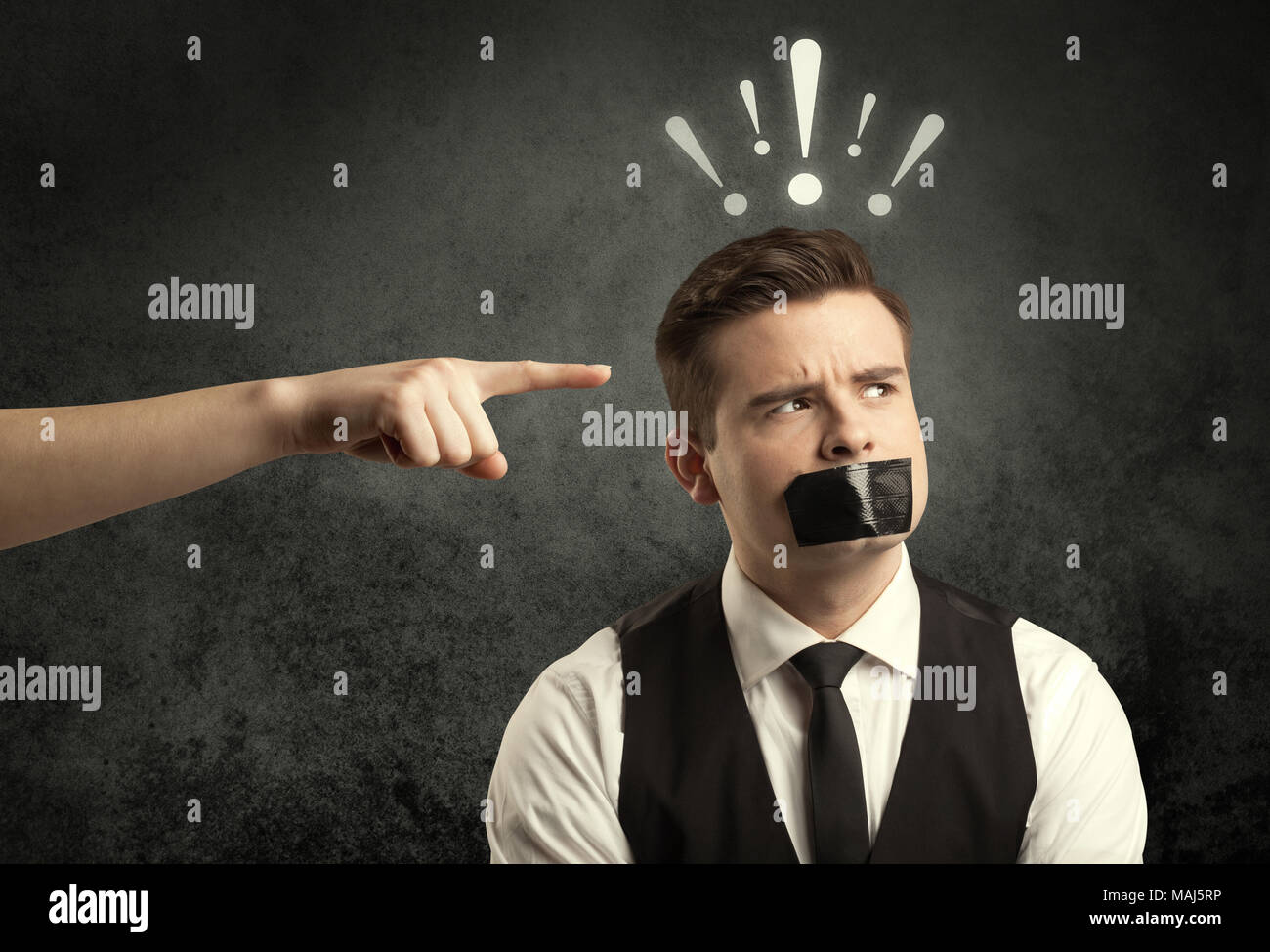 Caucasian hand pointing at employee in business suit, with drawn ...