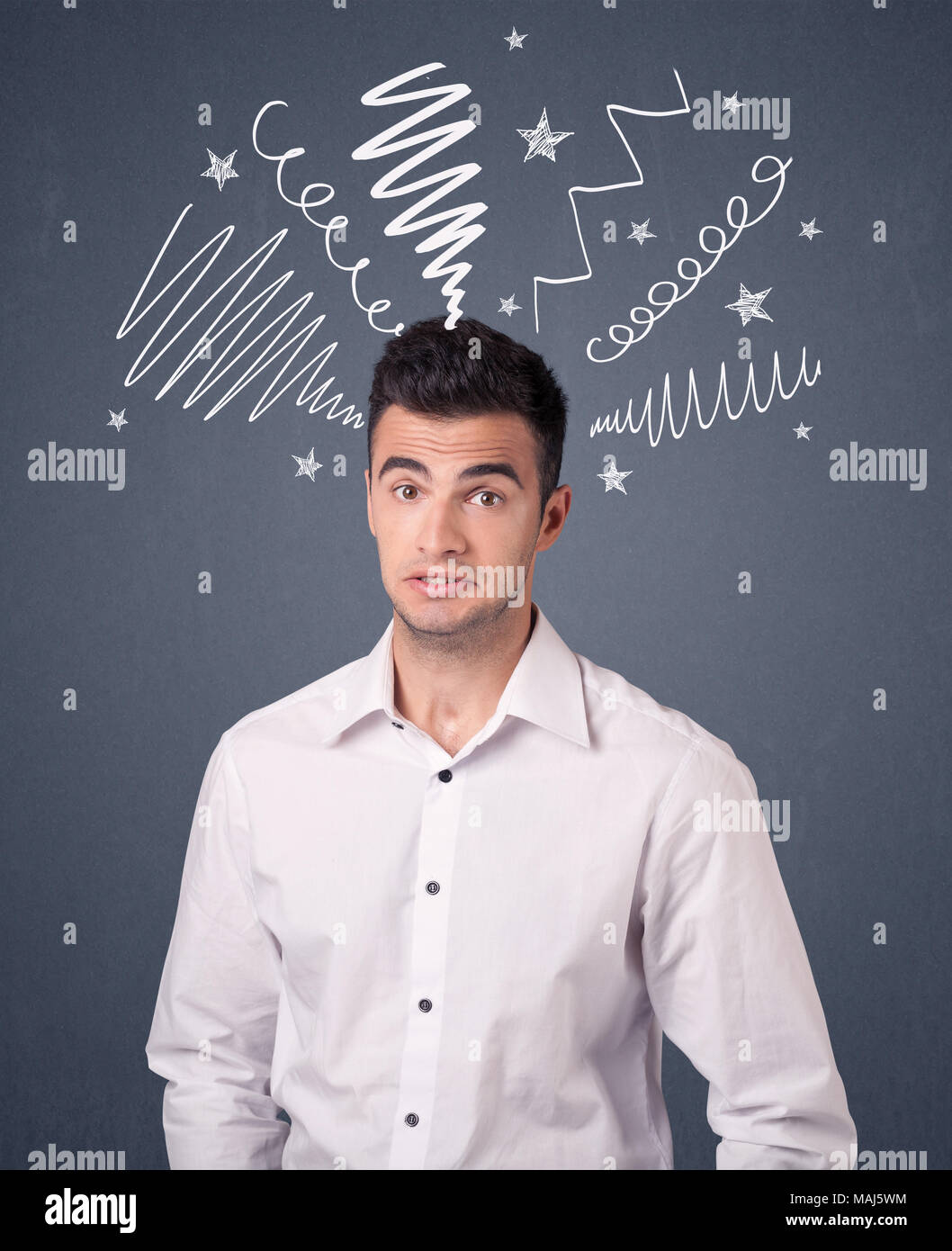 Young casual businessman with white scribbles around his head Stock ...