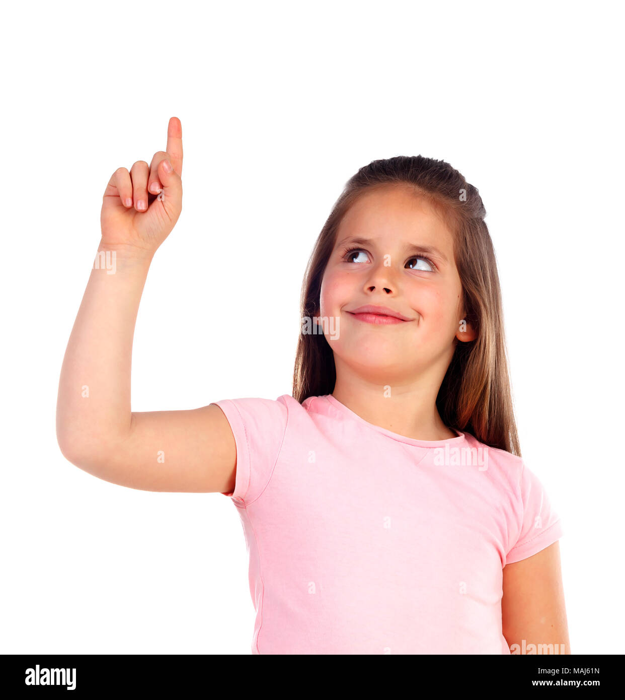Cute child girl pointing with his finger isolated on white background ...