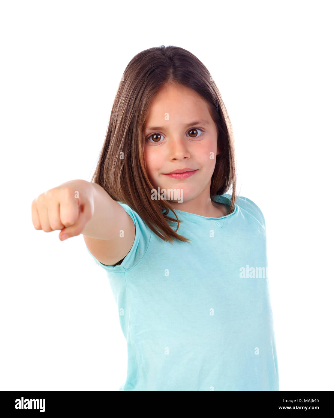 Cute child girl pointing with his finger isolated on white background ...