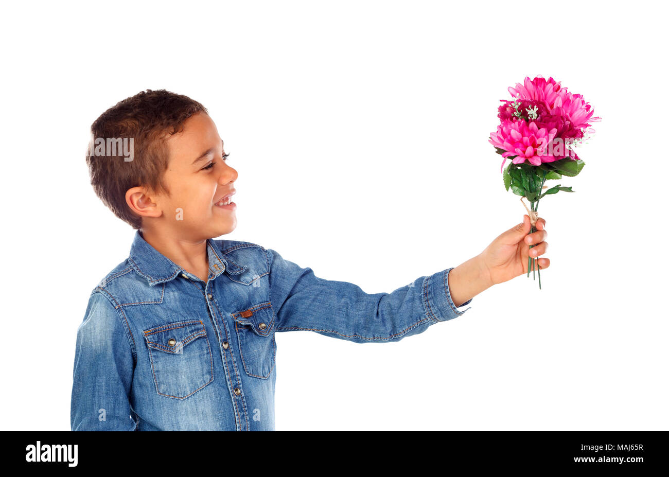Happy boy with a beautiful bouquet of pink flowers isolated on a white ...