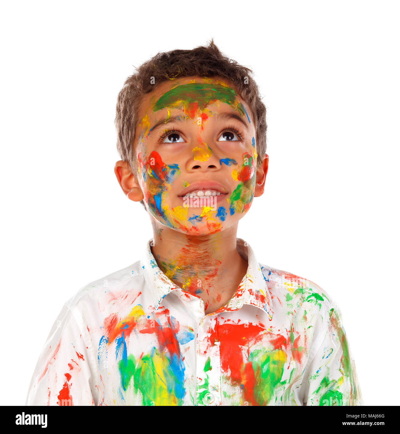 Funny boy with hands and face full of paint isolated on a white ...