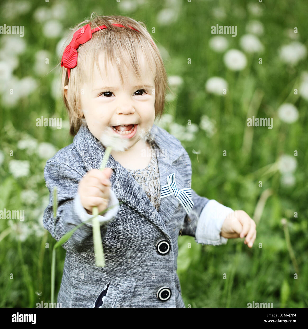 Happy child outdoors Stock Photo - Alamy