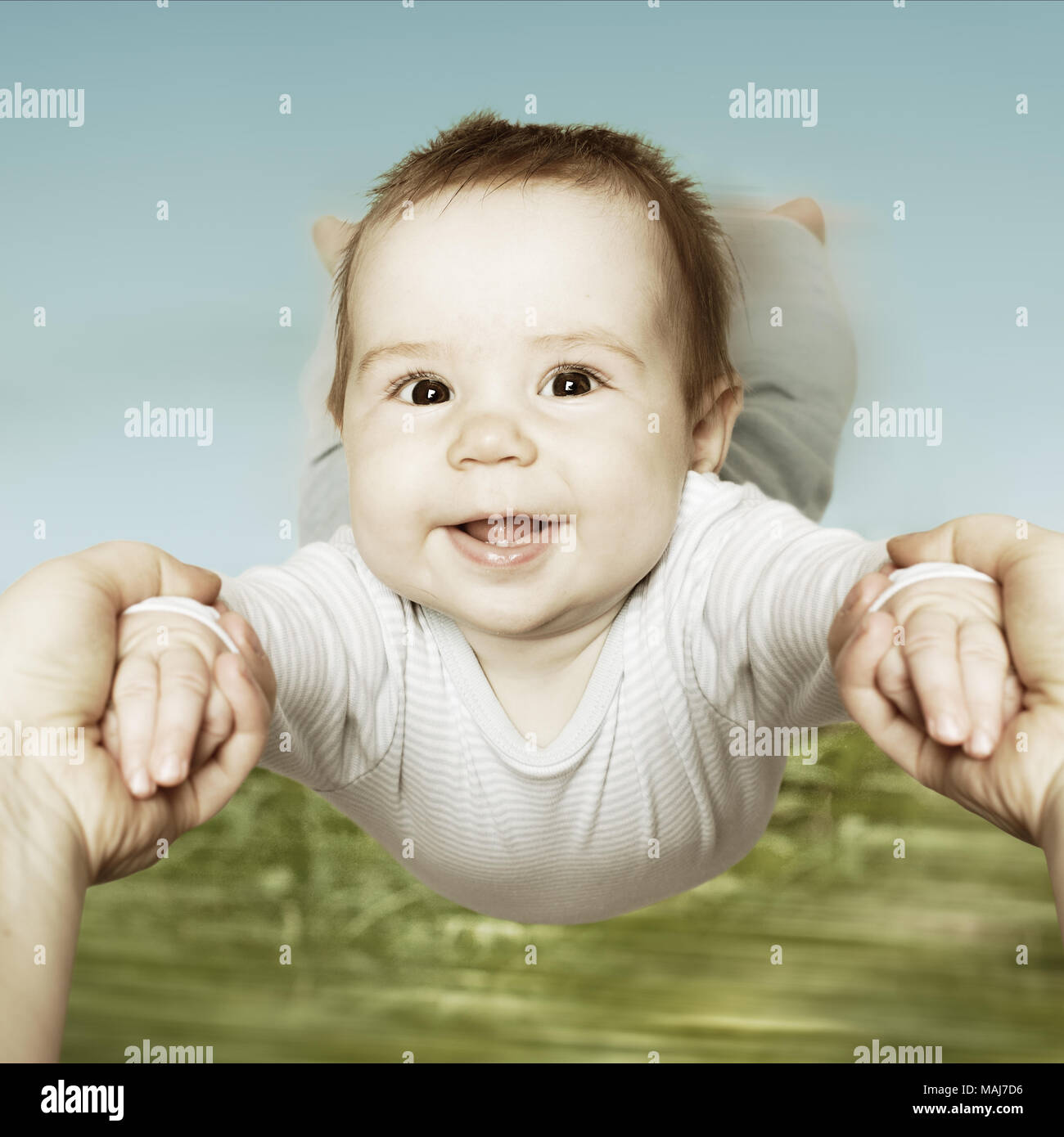 Happy cute baby fly Stock Photo - Alamy