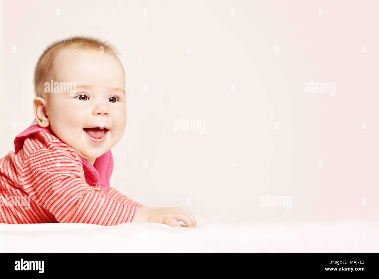 Happy Baby on Background. Cute Little Baby, 6 months Stock Photo - Alamy