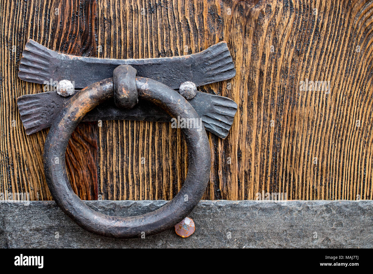 wooden gate with wrought iron elements close up Stock Photo - Alamy