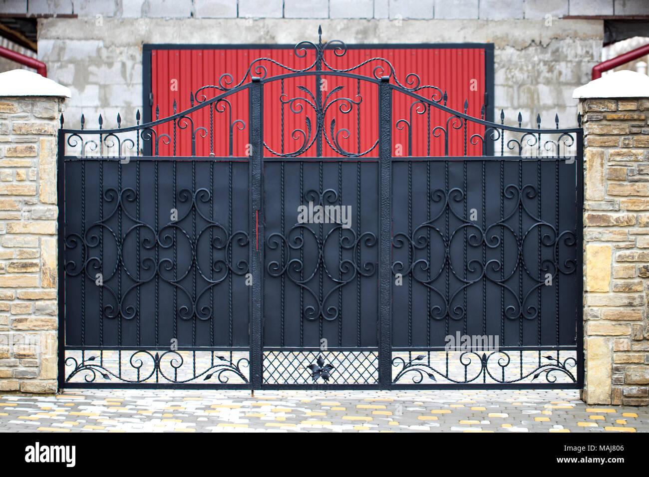 wrought-iron gates, ornamental forging, forged elements close-up Stock ...