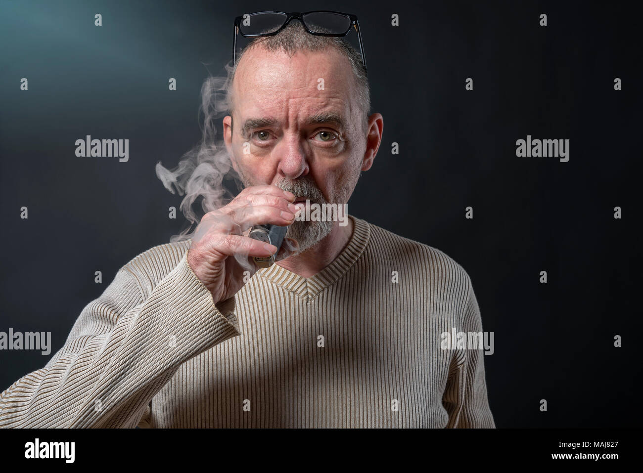 Vaping old man hi-res stock photography and images - Alamy