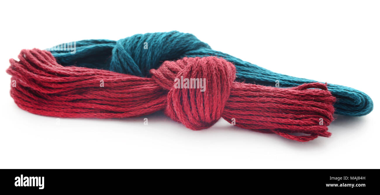 Woolen thread over white background Stock Photo - Alamy