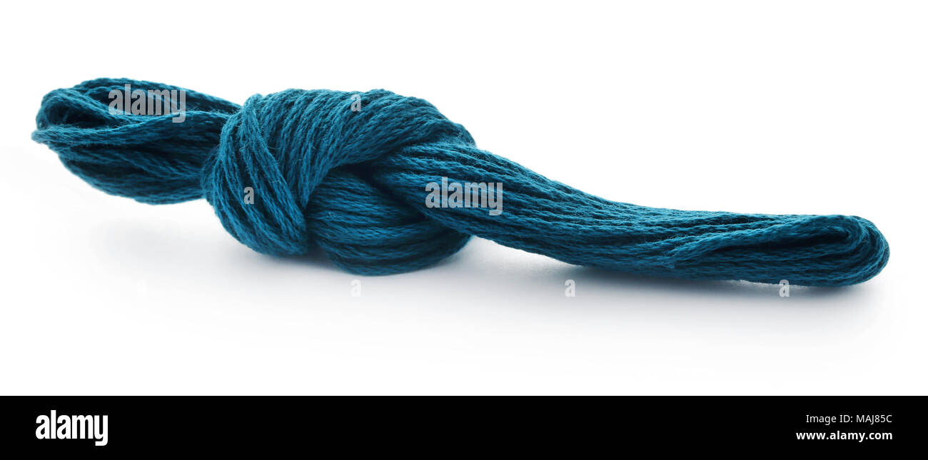 Woolen thread over white background Stock Photo - Alamy