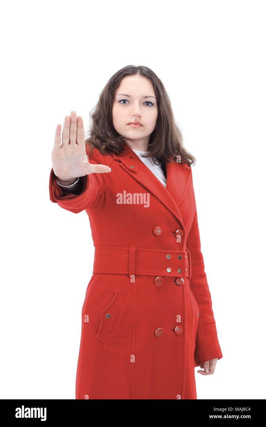 beautiful young woman in red coat showing showing stop sign Stock Photo ...