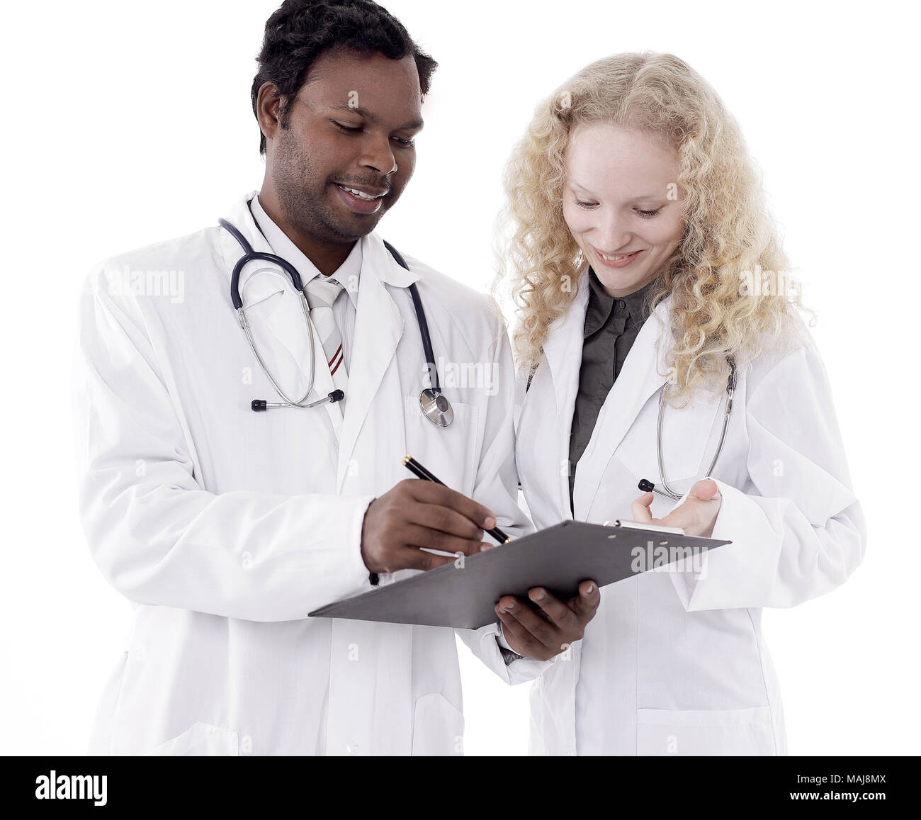 two doctors discussing a patient's diagnosis Stock Photo - Alamy