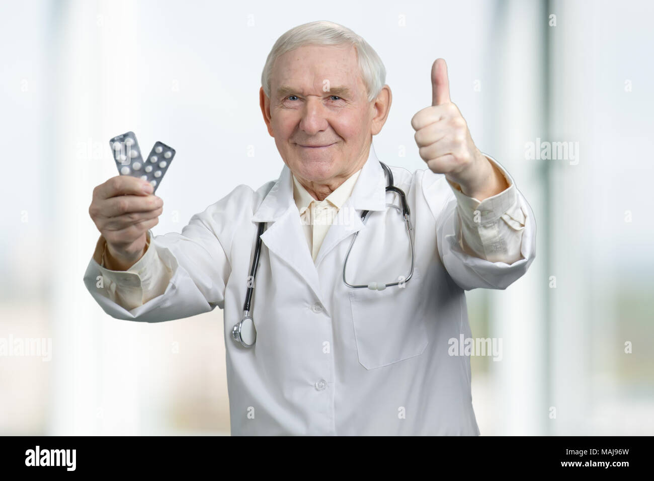 Old senior doctor two packs hi-res stock photography and images - Alamy