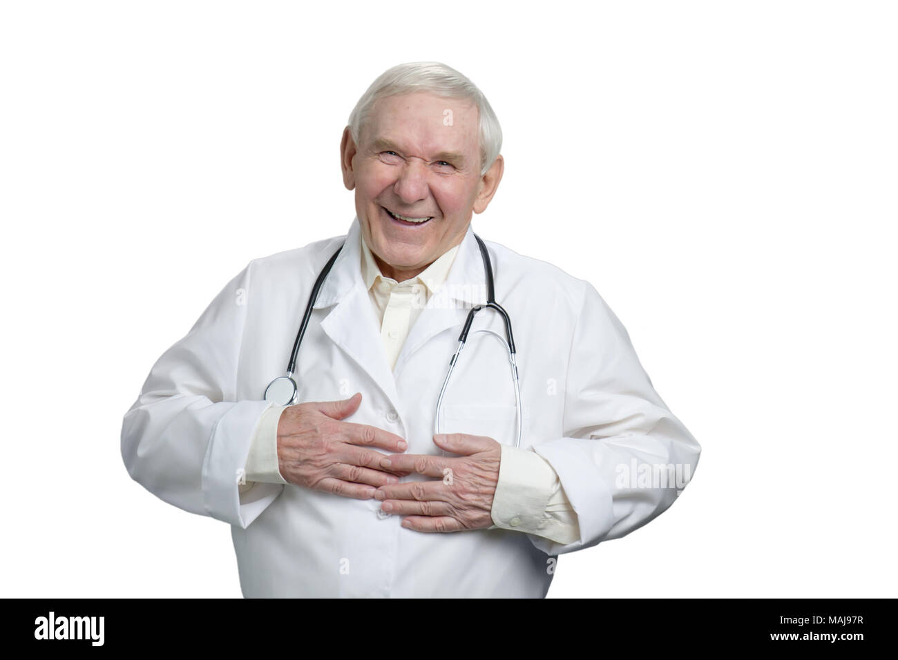 Old doctor laughing heartily touching stomach. Caucasian senior ...