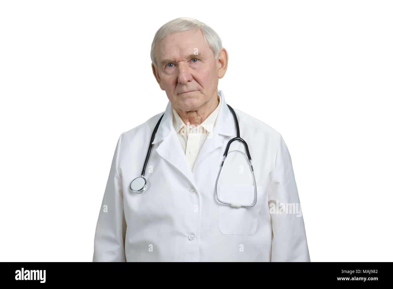 Old serious gloomy doctor portrait. Senior physician with stethoscope ...