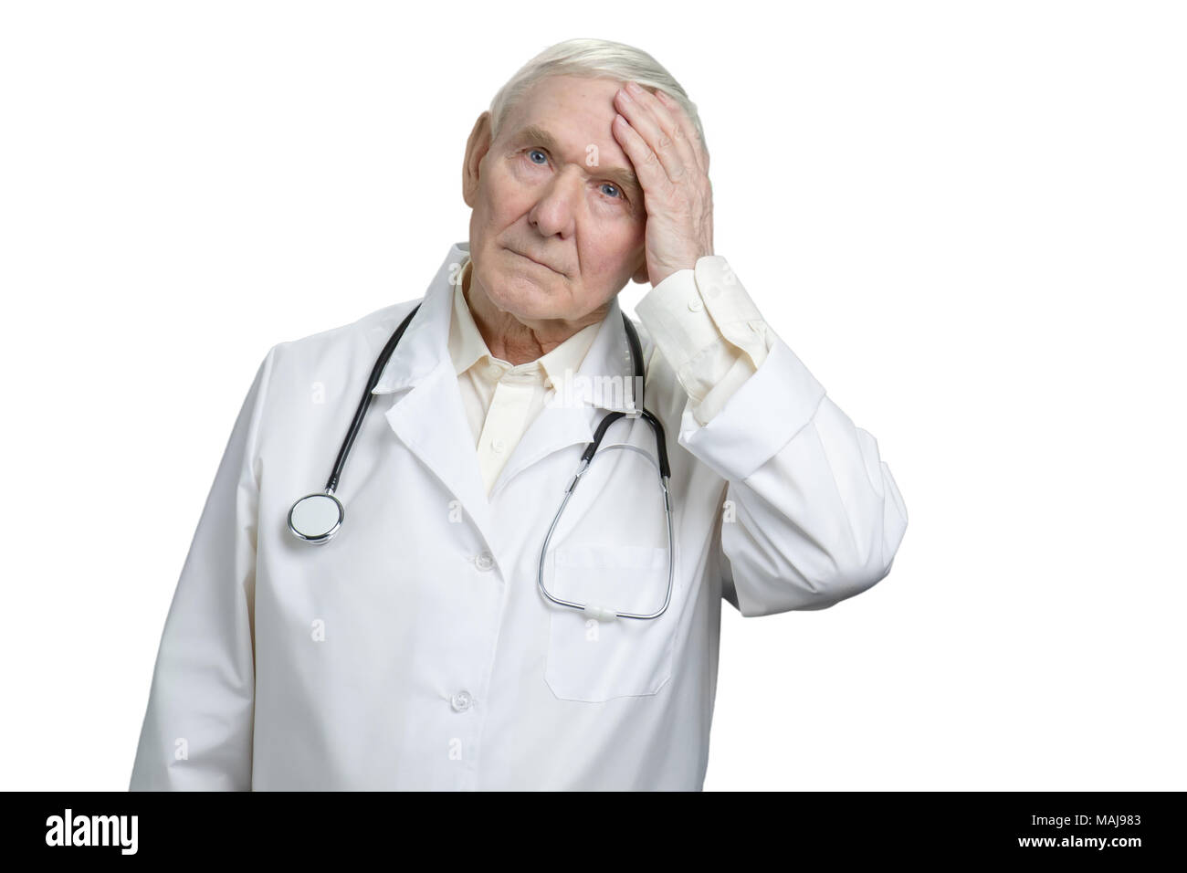 Old doctor feels sorry, regret about mistake. Senior physician having ...