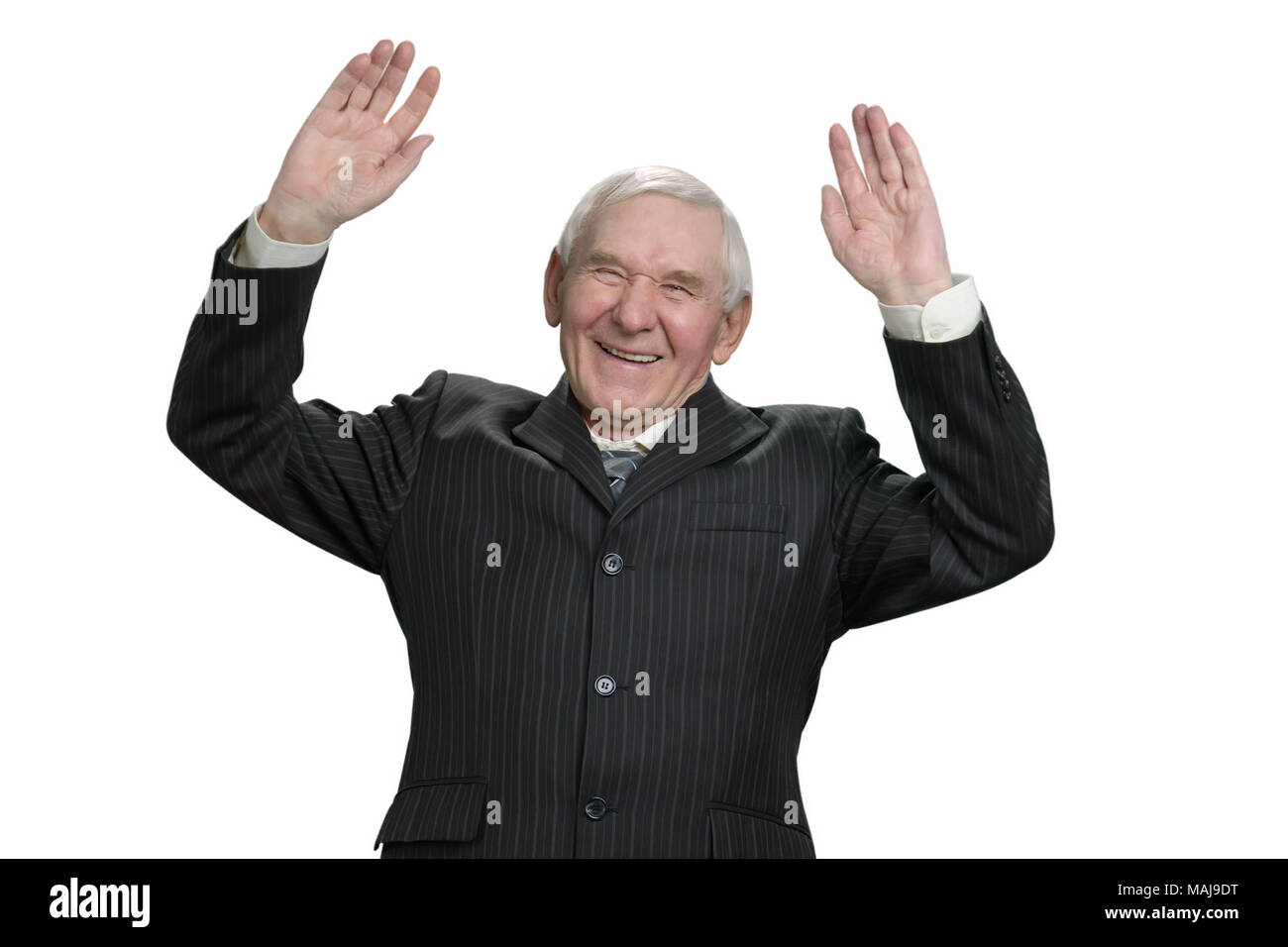 Businessman puts hands up. Laughing with raised hands, white isolated ...