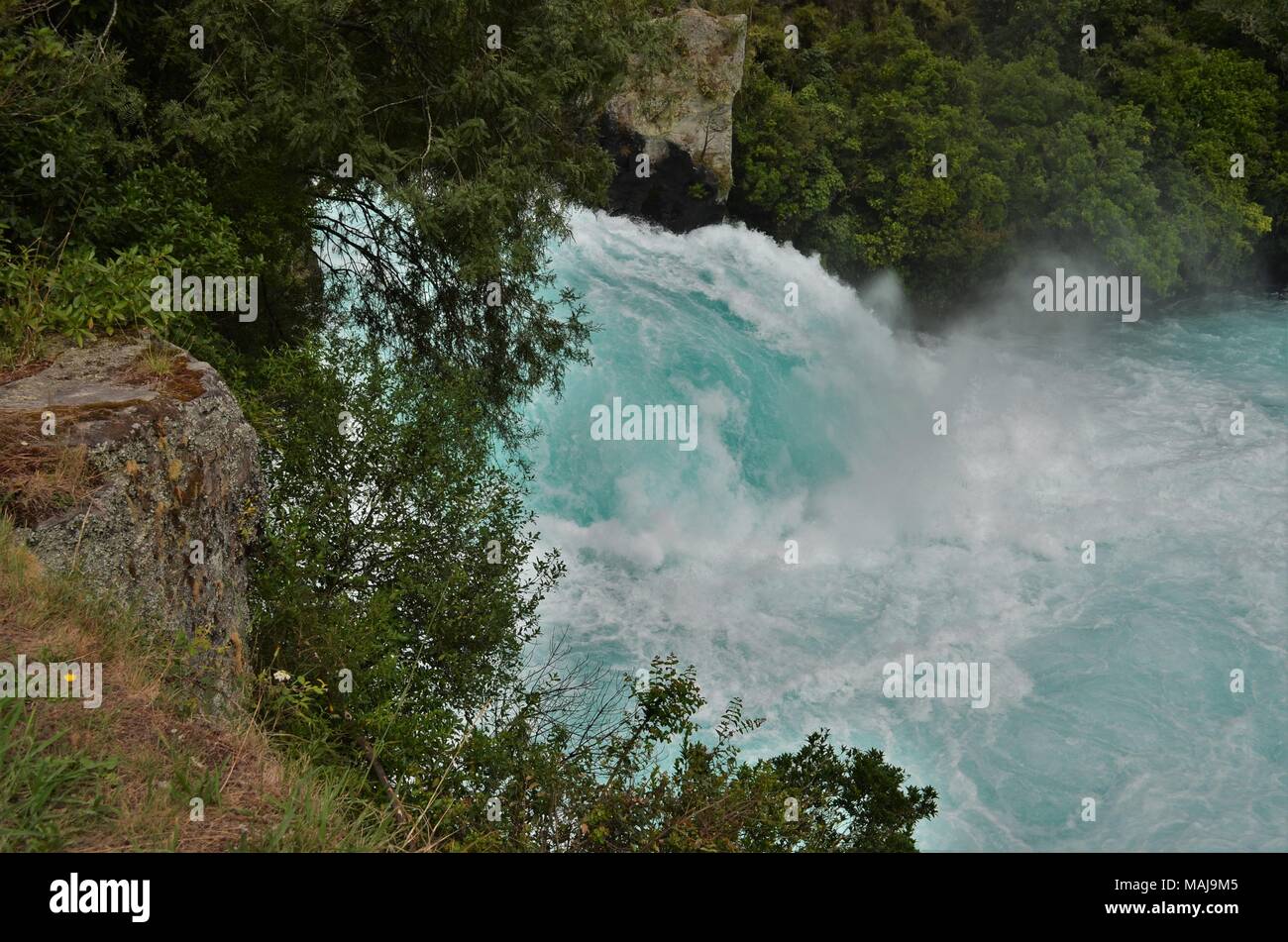 Famous Huka waterfalls with ice blue water Stock Photo - Alamy