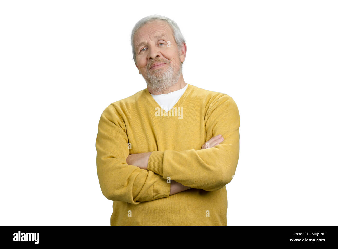 Portrait of old caucasian man with folded arms. Senior grandpa with ...