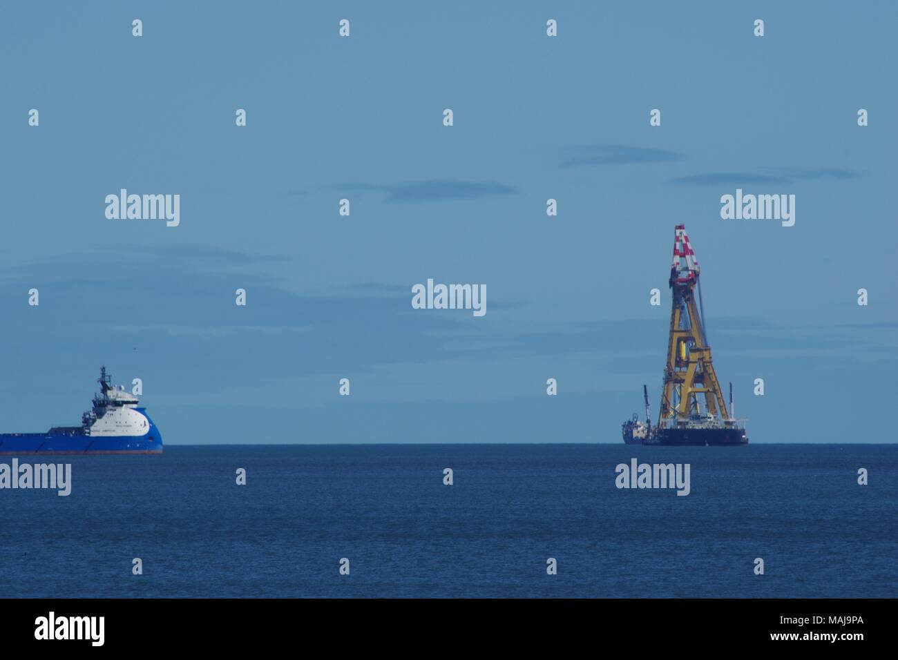 North Sea Oil Industry, Oil Support Vessel, and Derrick Structure ...