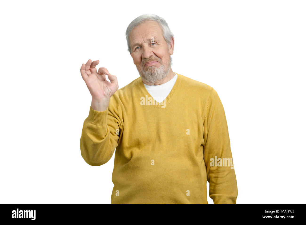 Portrait of old grandpa making ok gesture. White isolated background ...