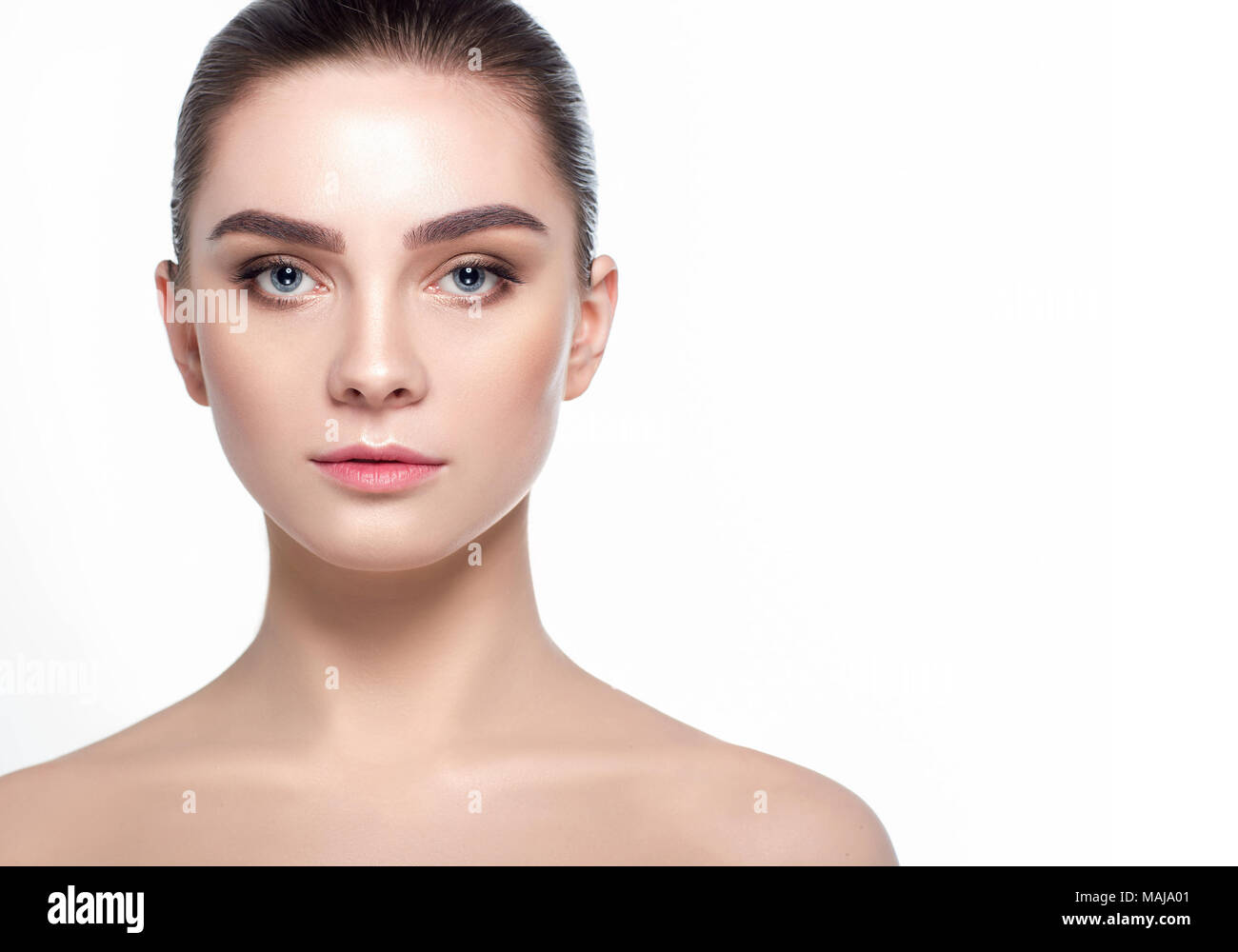 Portrait woman with fresh clean face and wide eyebrows Stock Photo - Alamy