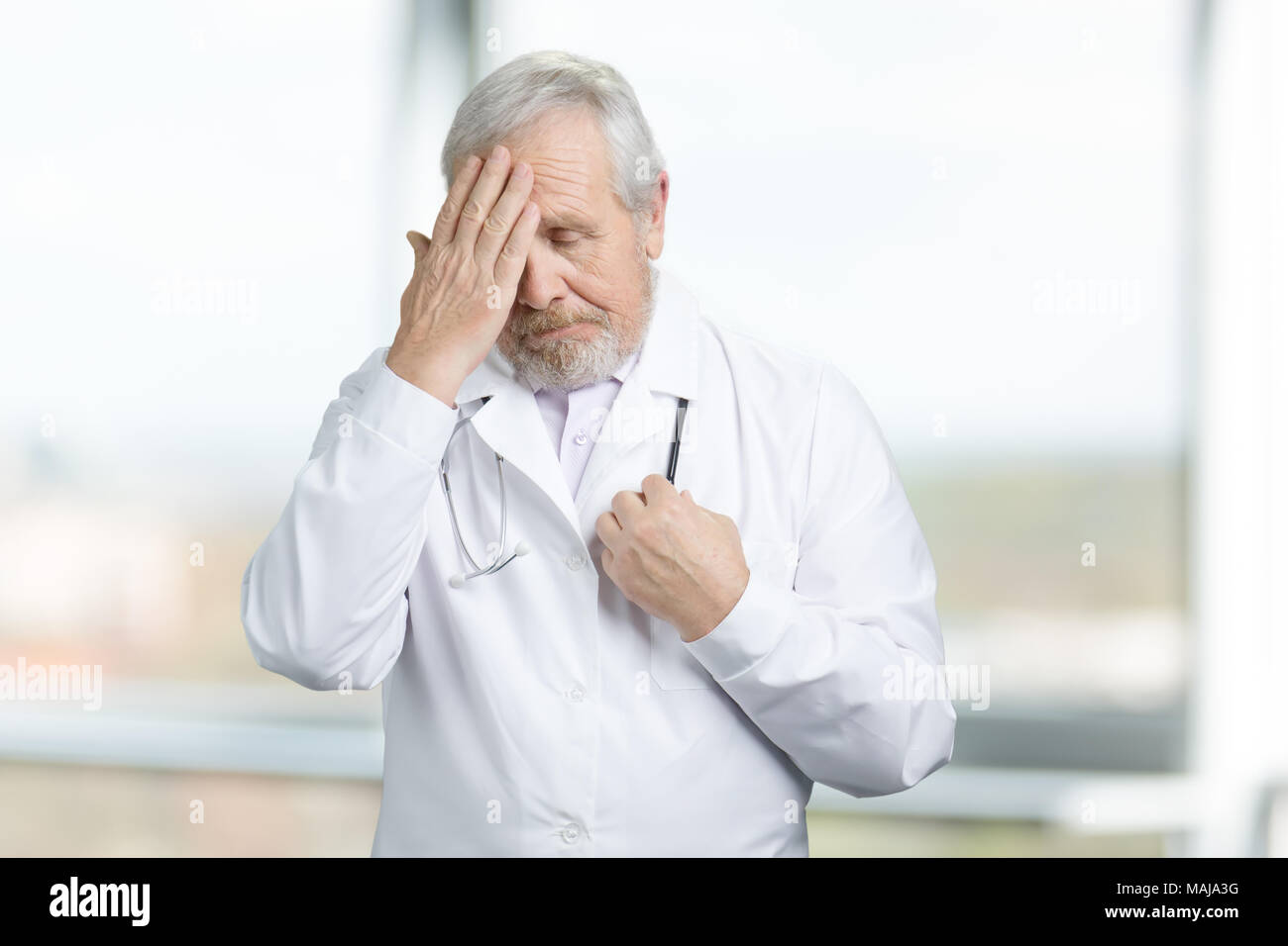 Concept of old doctor regret about mistake, feeling sorry. Doctor ...