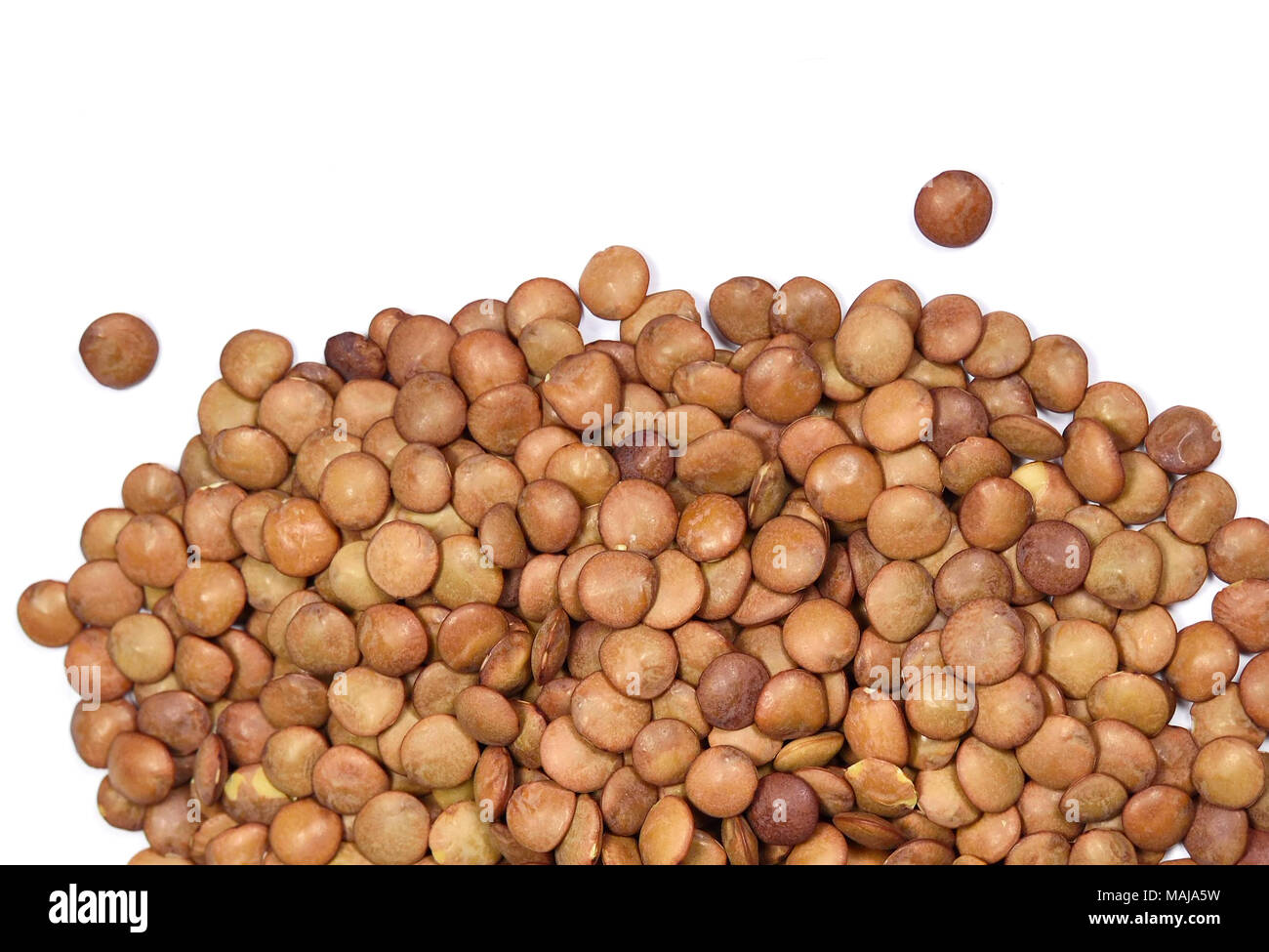 Brown lentils, isolated on white background. Heap or pile of raw and dried lentils Stock Photo ...