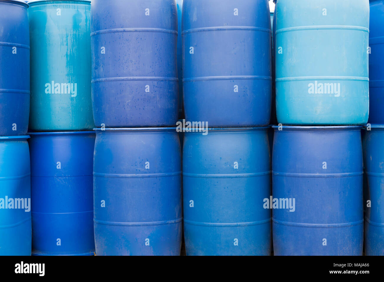 Chemical Plant, Plastic Storage Drums, Big Blue Barrels Stock Photo - Alamy