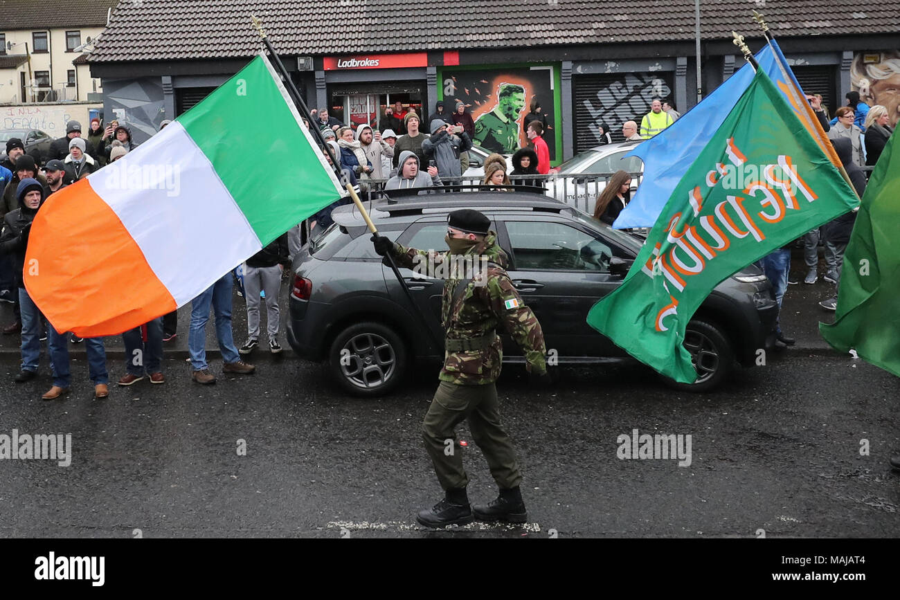 A Republican colour party during their Easter Commemoration parade in ...