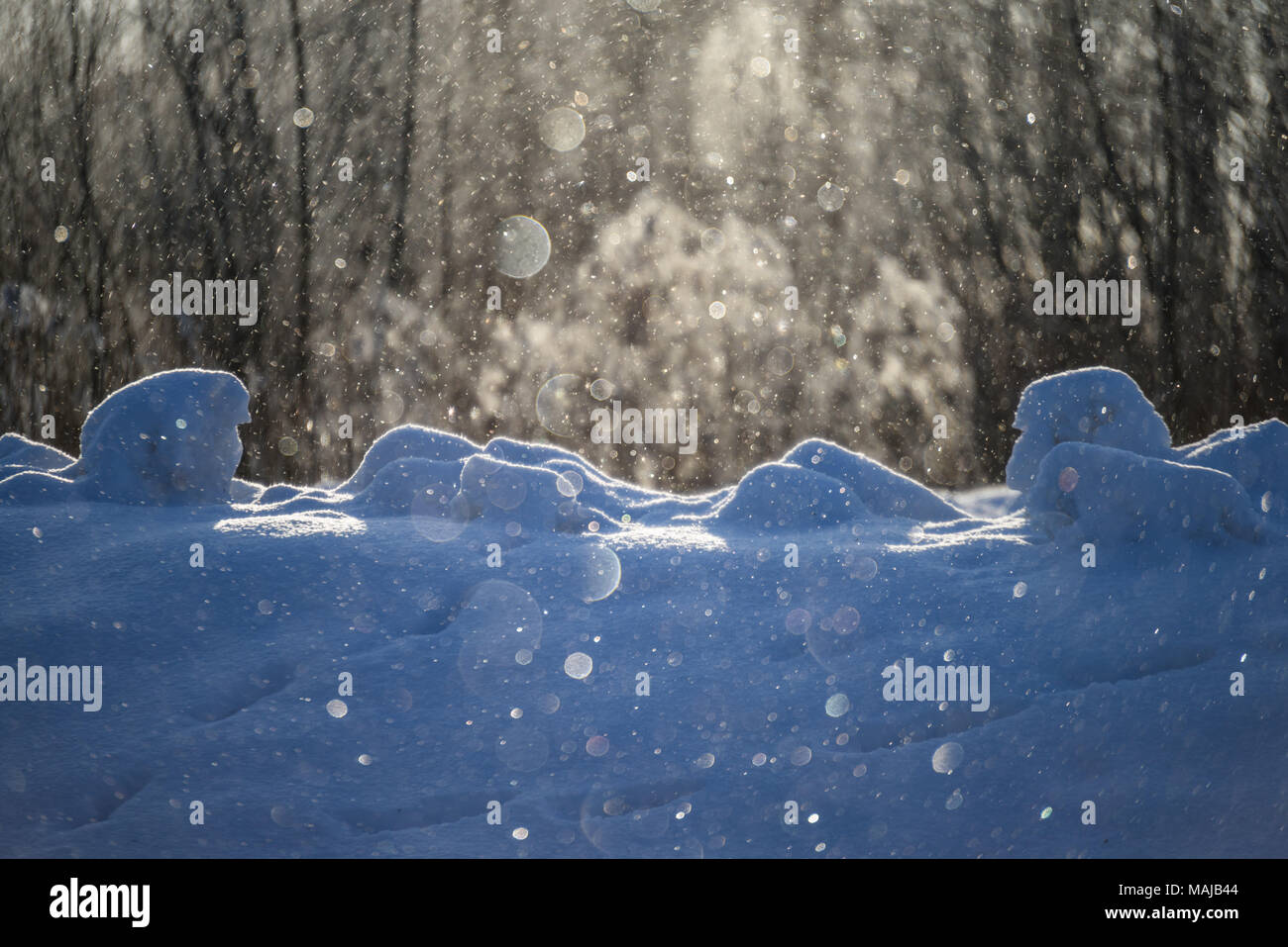 snow flakes falling in blizzard with white snow background with shadows ...