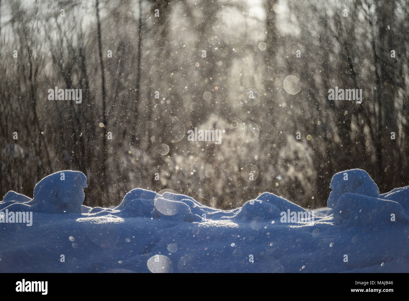 snow flakes falling in blizzard with white snow background with shadows ...