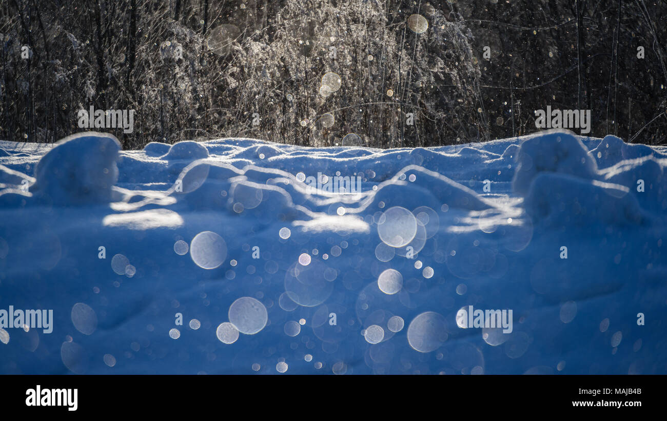 snow flakes falling in blizzard with white snow background with shadows ...