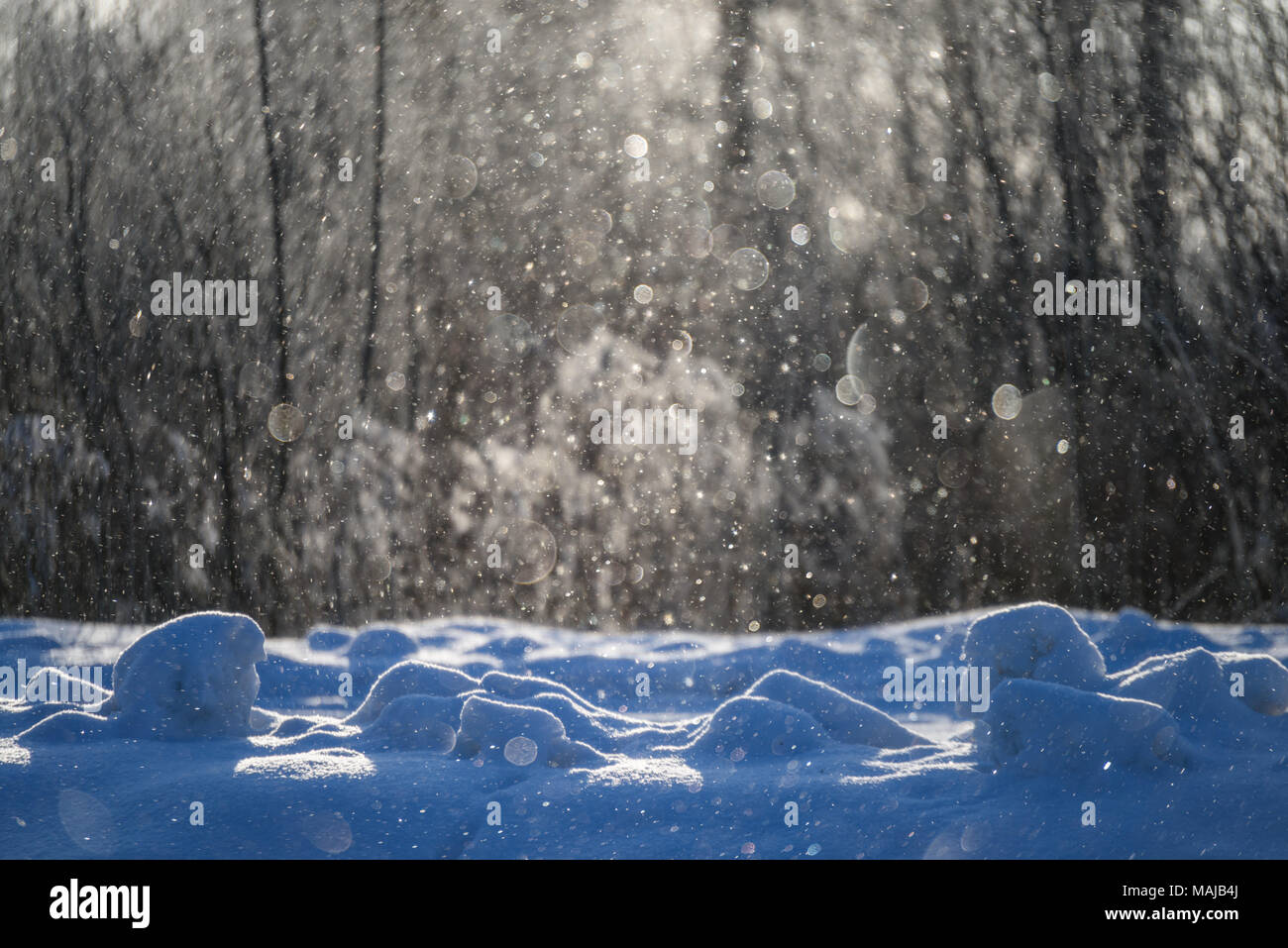 snow flakes falling in blizzard with white snow background with shadows ...