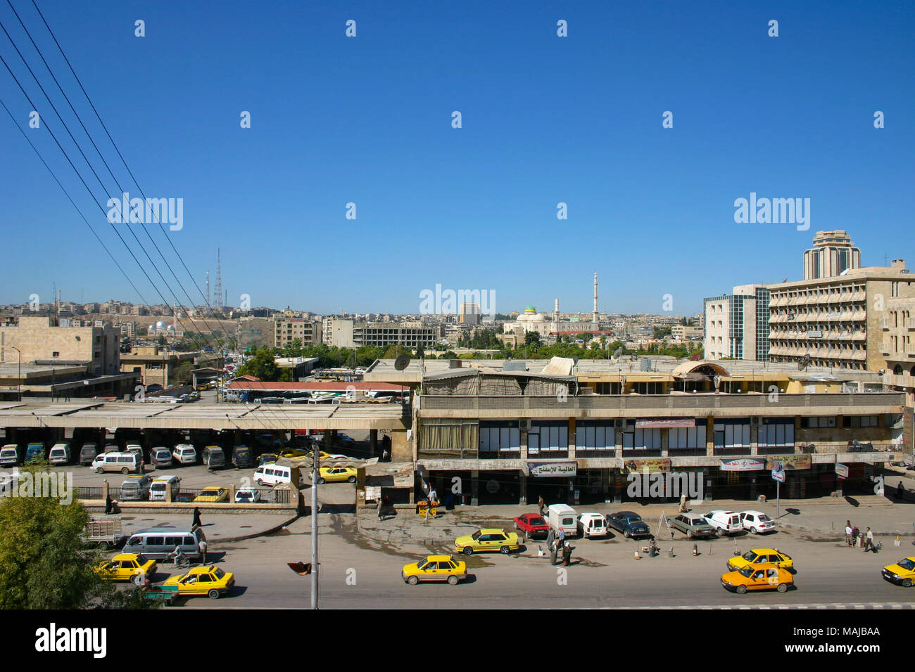 View over Aleppo city skyline and bus station before conflict, Syria ...